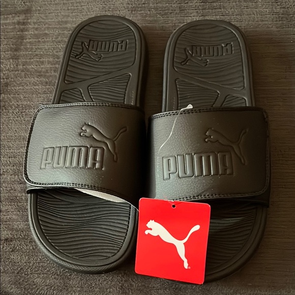 Puma | Shoes | Puma Black Slide Sandals With Embossed Logo | Poshmark